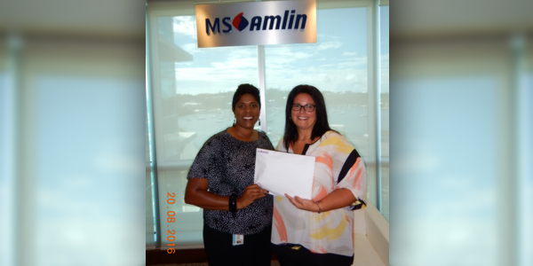 MS Amlin Help Provide School Shoes For Kids - Bernews