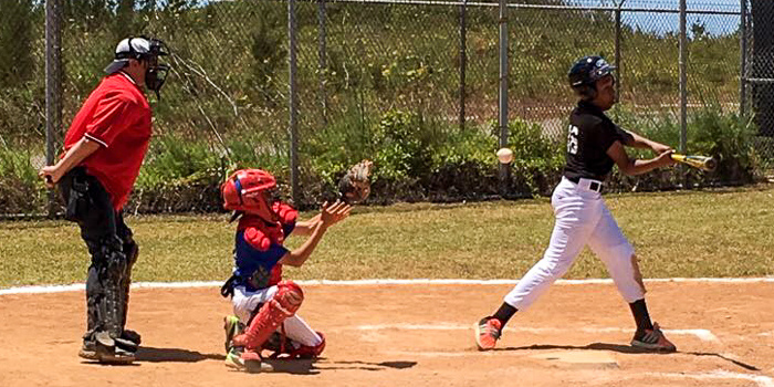 Photos: Marlins Win In Baseball League Action - Bernews