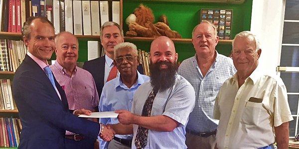 Prudent Group Donates $15K To Reading Clinic - Bernews