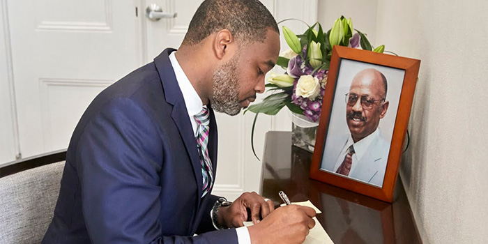Premier David Burt Signs Condolence Book - Bernews