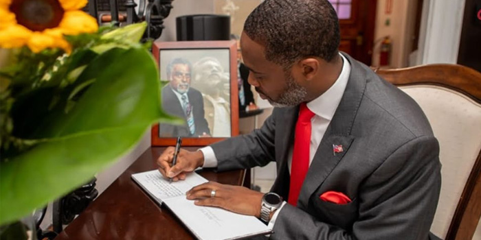 Premier David Burt Signs Condolence Book - Bernews