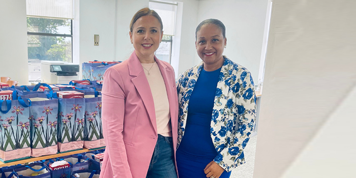 One Comm Donates Groceries To 50 Families - Bernews