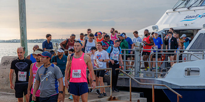 Photos: Athletes Arrive For Bermuda Day Race - Bernews