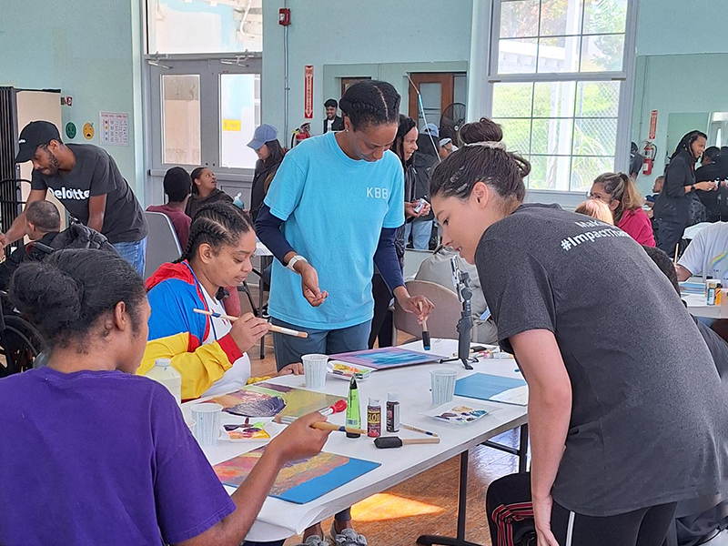 Deloitte Staff Volunteer During 'Impact Day' - Bernews