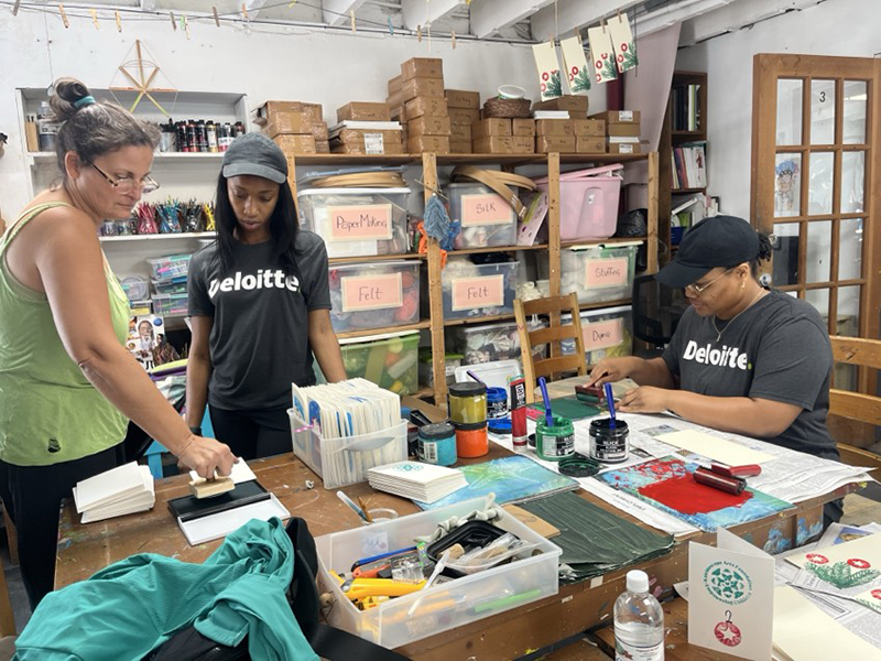 Deloitte Staff Volunteer During 'Impact Day' - Bernews